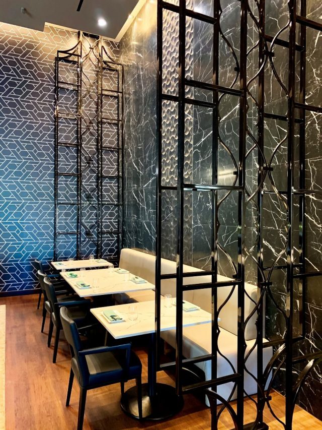 Vibrant artwork has been introduced to give the space colour and a ...