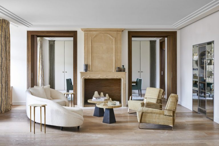 The welcome area is designed with gold and wood-toned palette and opens ...
